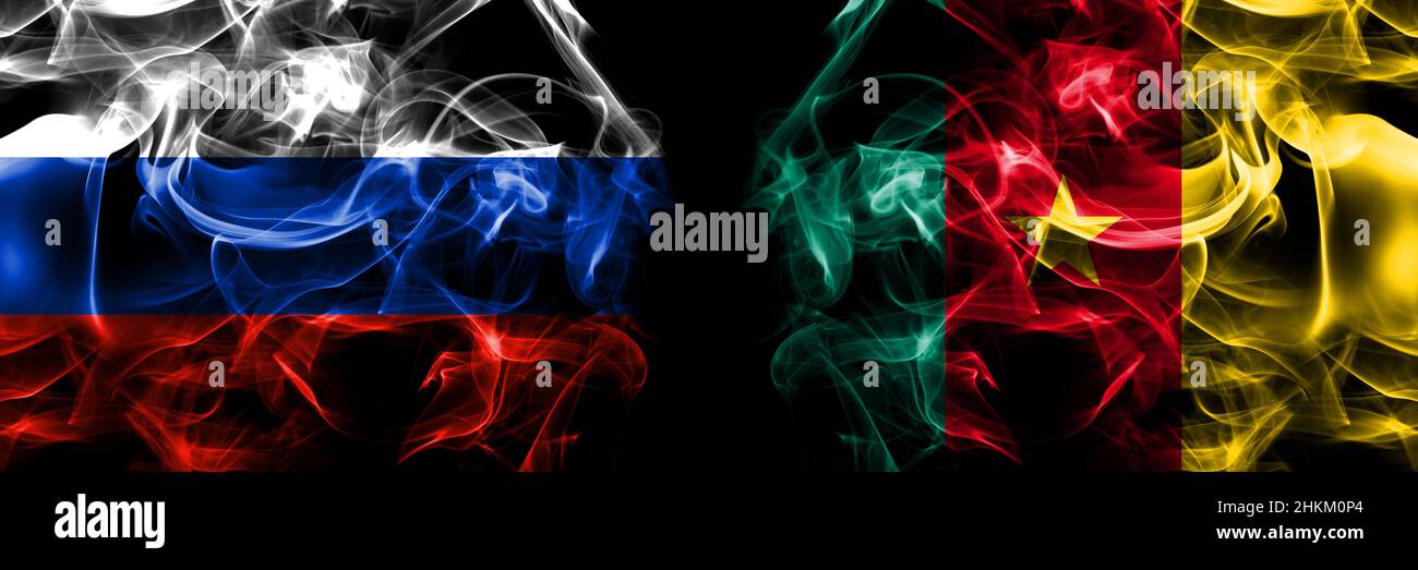 Russia, Russian vs Cameroon, Cameroonian flags. Smoke flag placed side ...