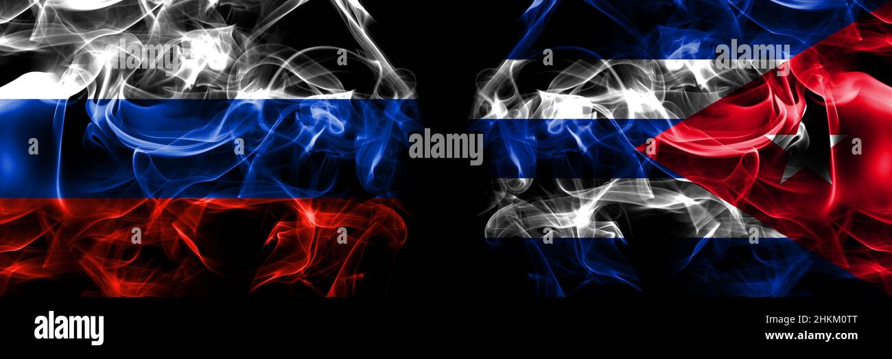 Russia, Russian vs Cuba, Cuban flags. Smoke flag placed side by side ...
