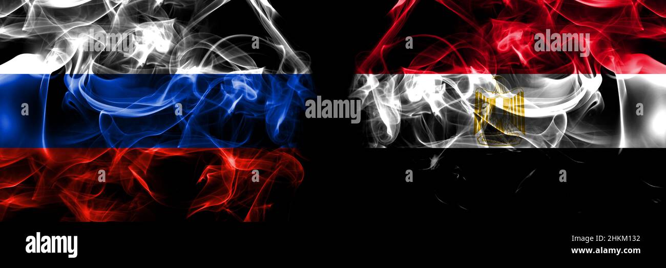 Russia, Russian vs Egypt, Egyptian flags. Smoke flag placed side by ...