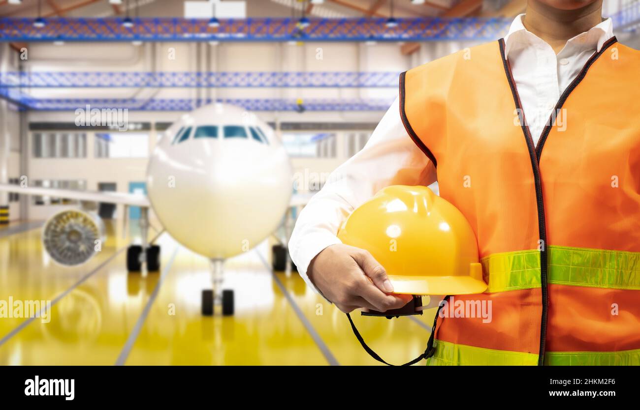 Asian engineer or technician work with airplane in hangar Stock Photo ...