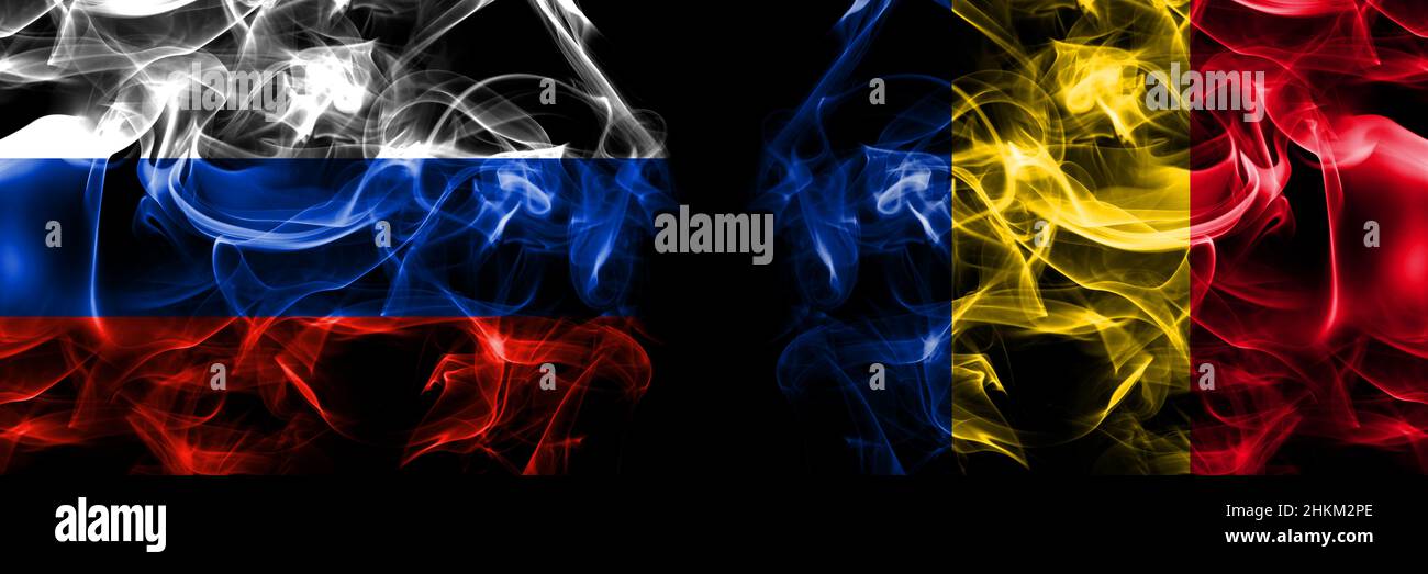 Russia, Russian vs Romania, Romanian flags. Smoke flag placed side by ...