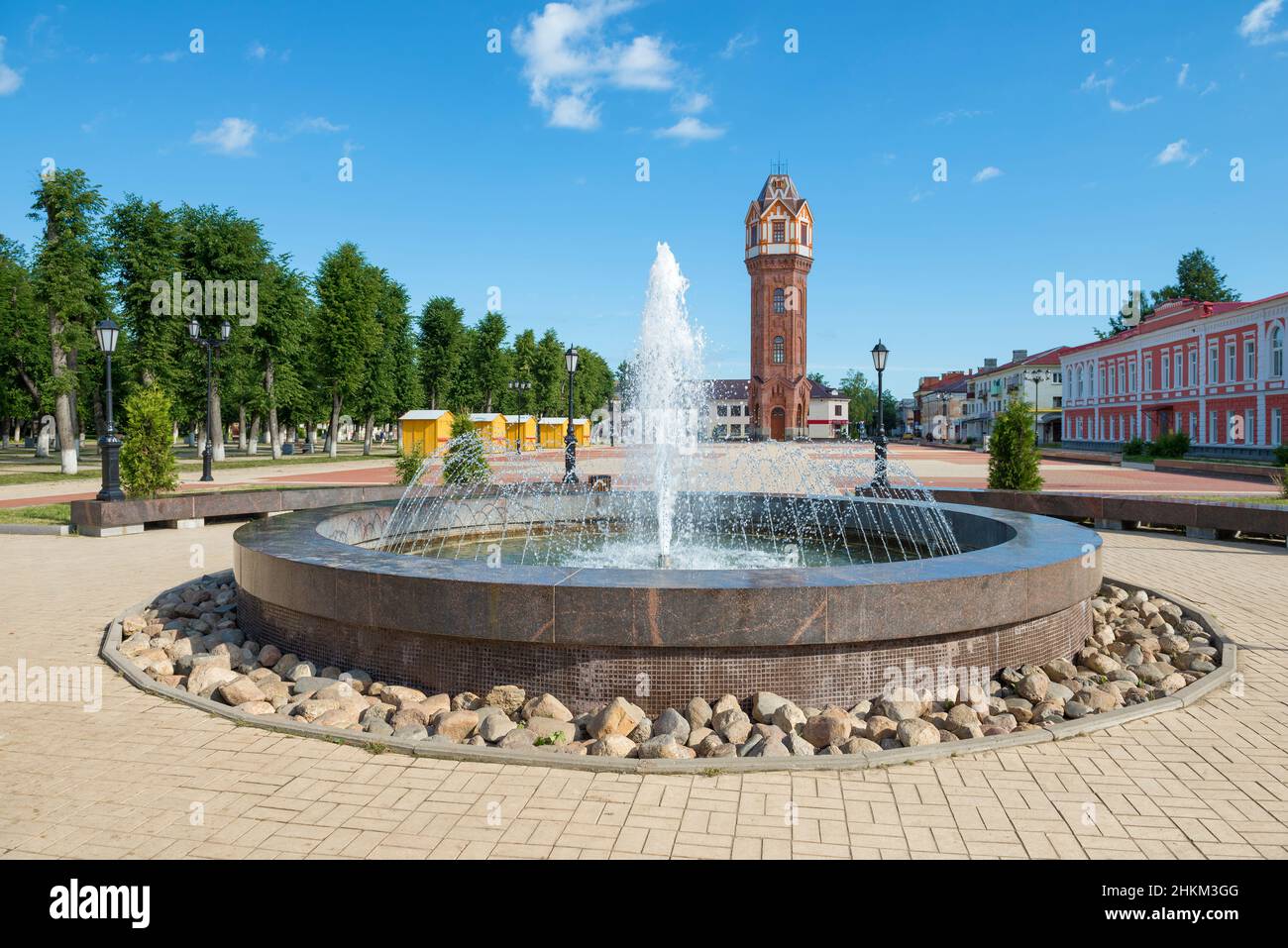 Fountain on the city square on a sunny July morning. Staraya Russa ...