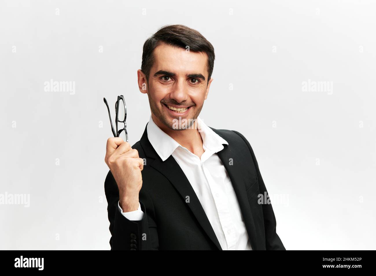 successful man in a modern suit emotion self-confidence official light ...