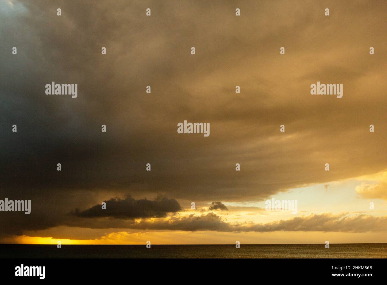 Beautiful cloudy sunset sky over Glitter Bay in Barbados Stock Photo ...