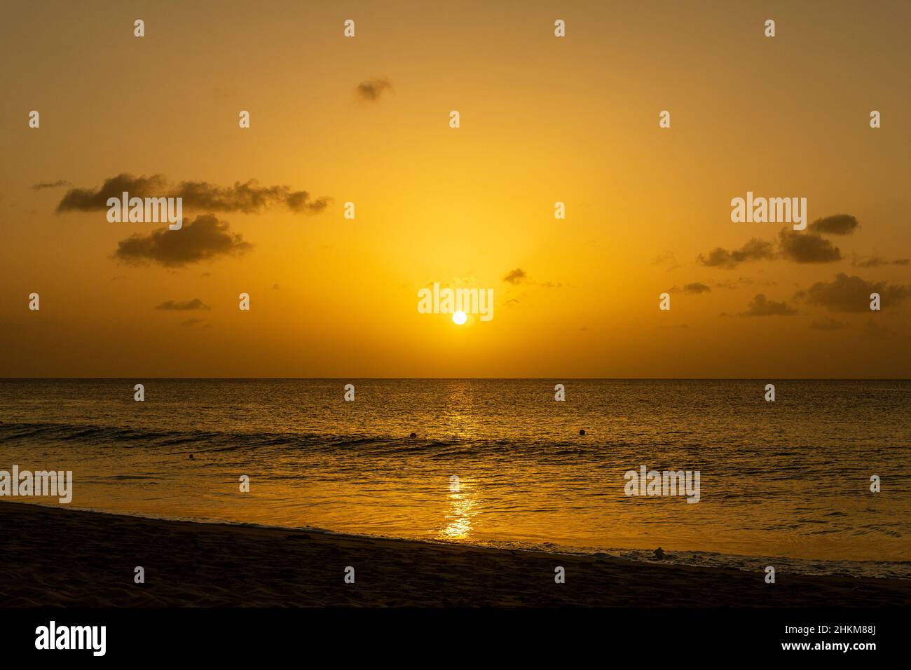 A beautiful cloudy sunset sky over Glitter Bay in Barbados Stock Photo ...