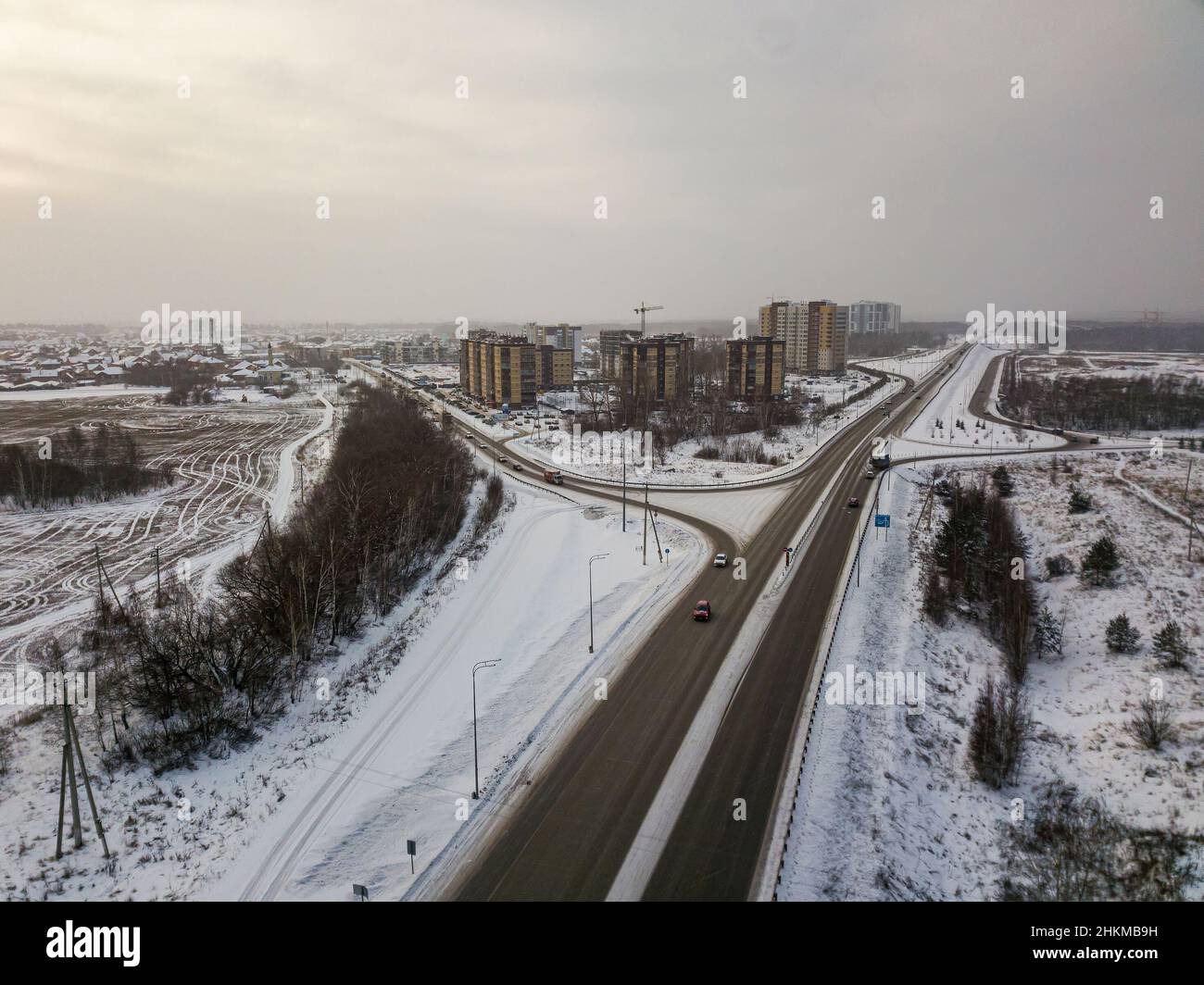 Entrance to a new urban area. Development of the suburbs with high-rise ...