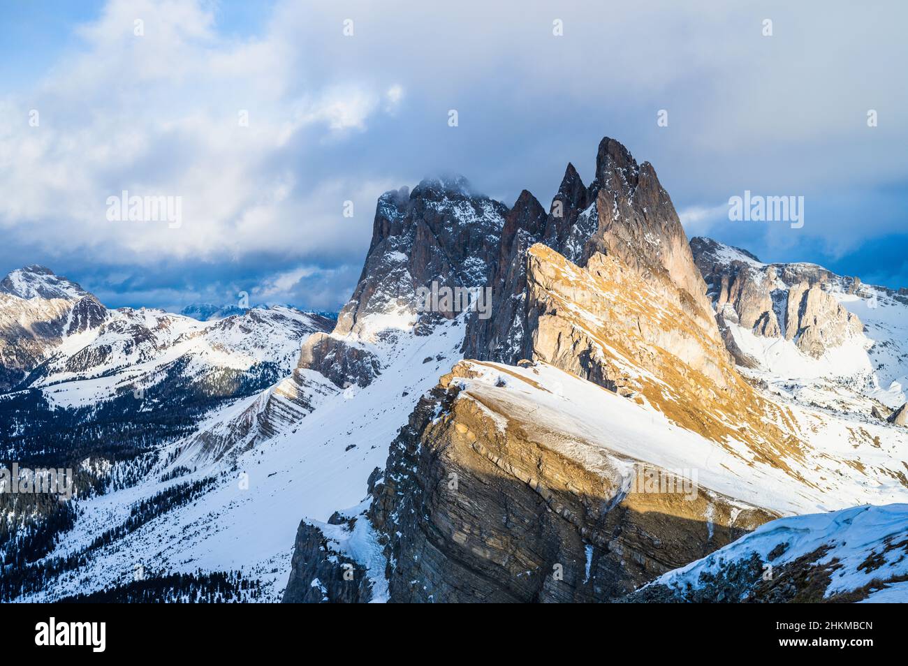 Seceda peak between clouds and snow in winter, Dolomites Alps, Italy ...