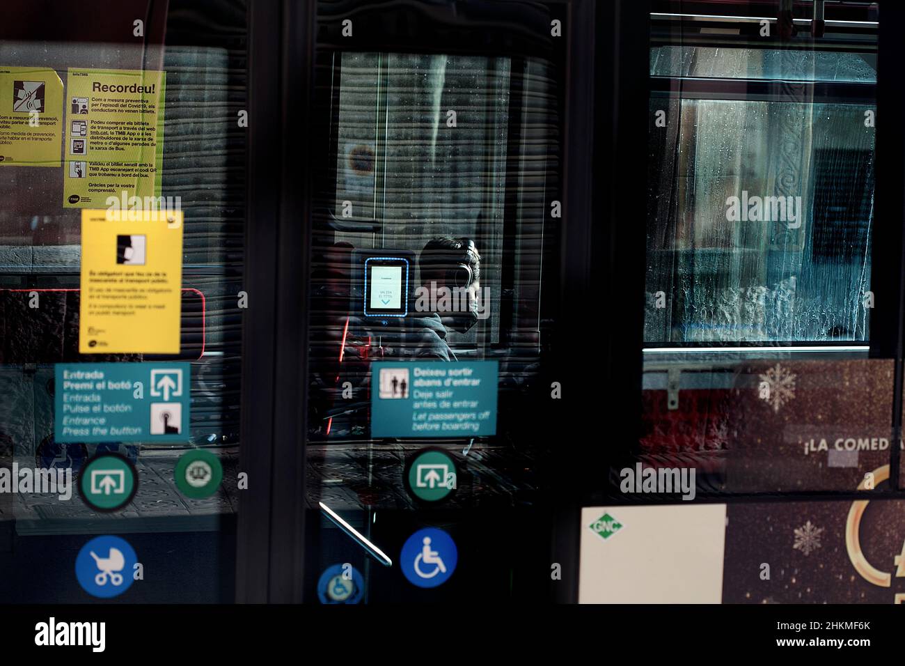 Man headphones public transport hi-res stock photography and images - Alamy