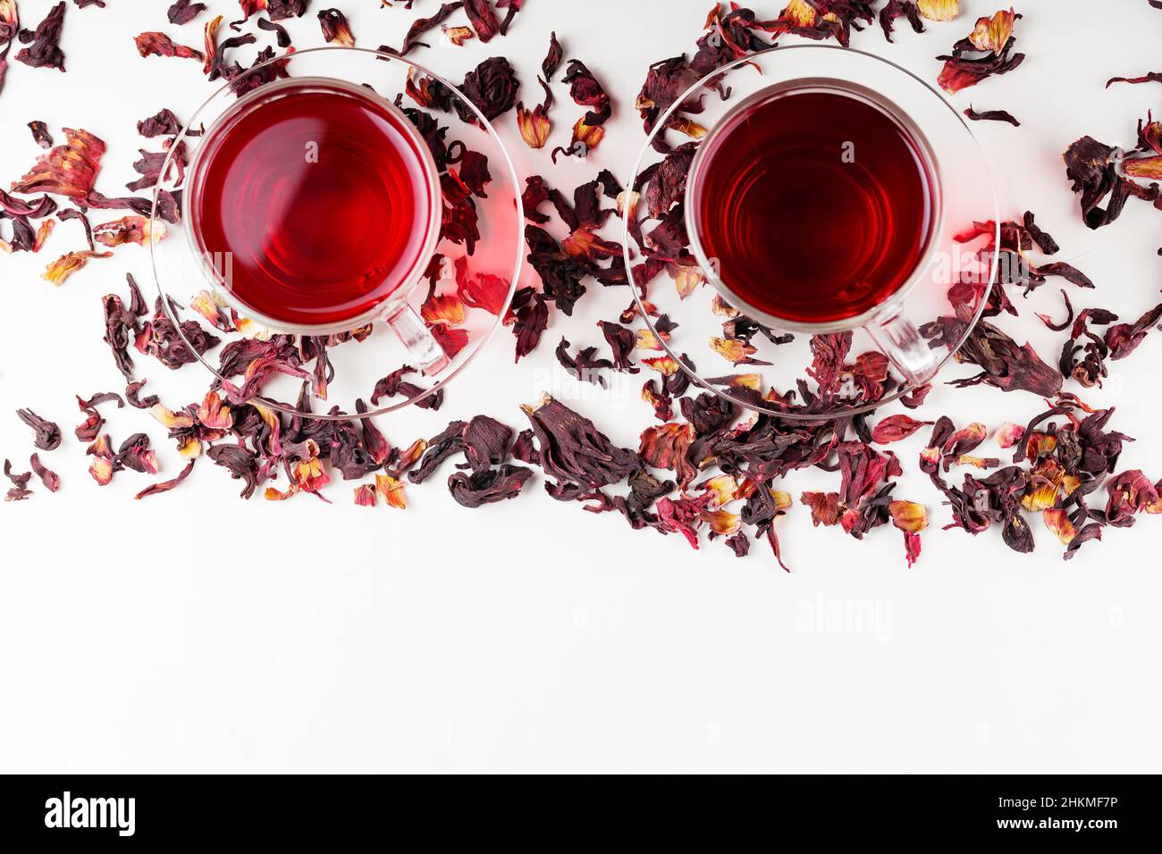 Cup of hibiscus tea (rosella, karkade, red sorrel) on a white ...