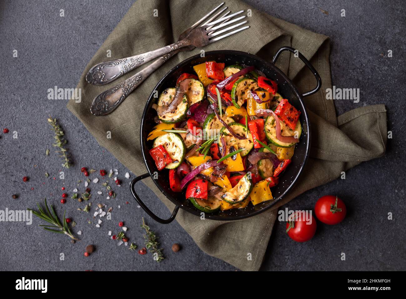 Roasted cooked assorted vegetables with herbs and spices Stock Photo ...