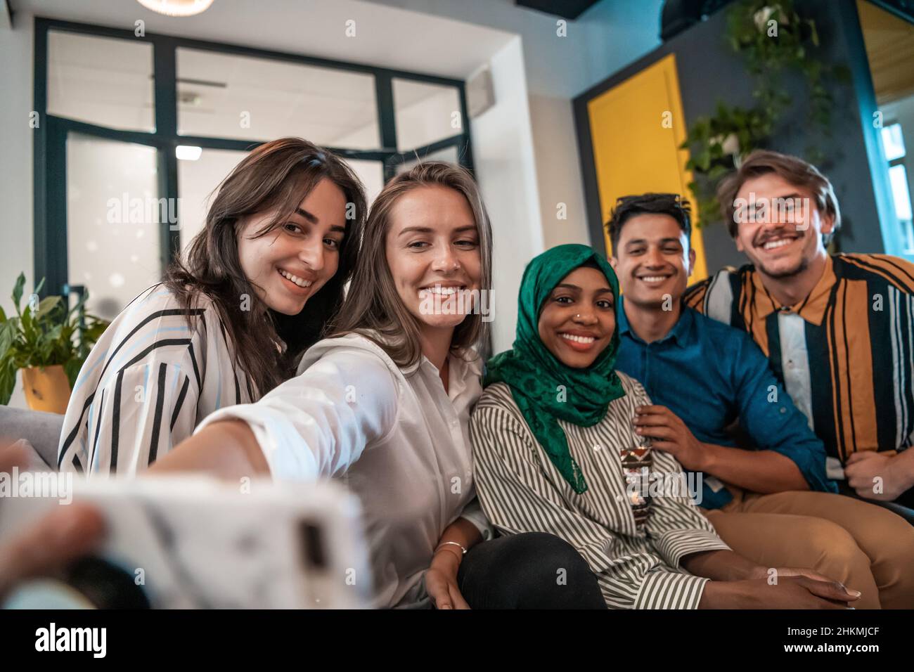 Group of business people during break from the work taking selfie ...