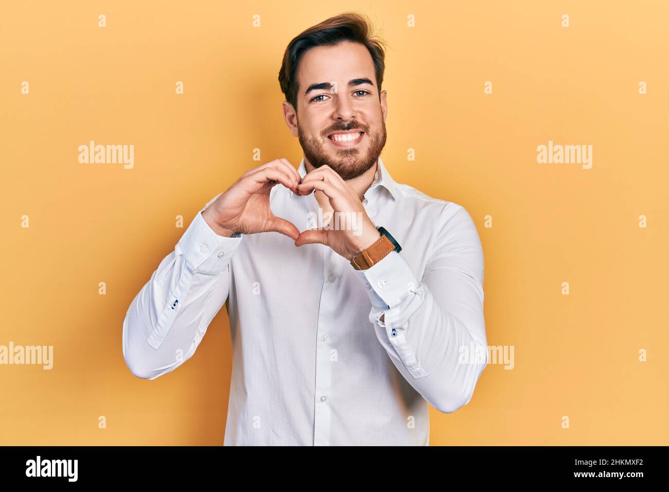Handsome caucasian man with beard wearing business white shirt smiling ...