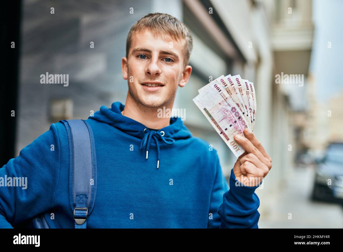 Man studying at banknote hi-res stock photography and images - Alamy