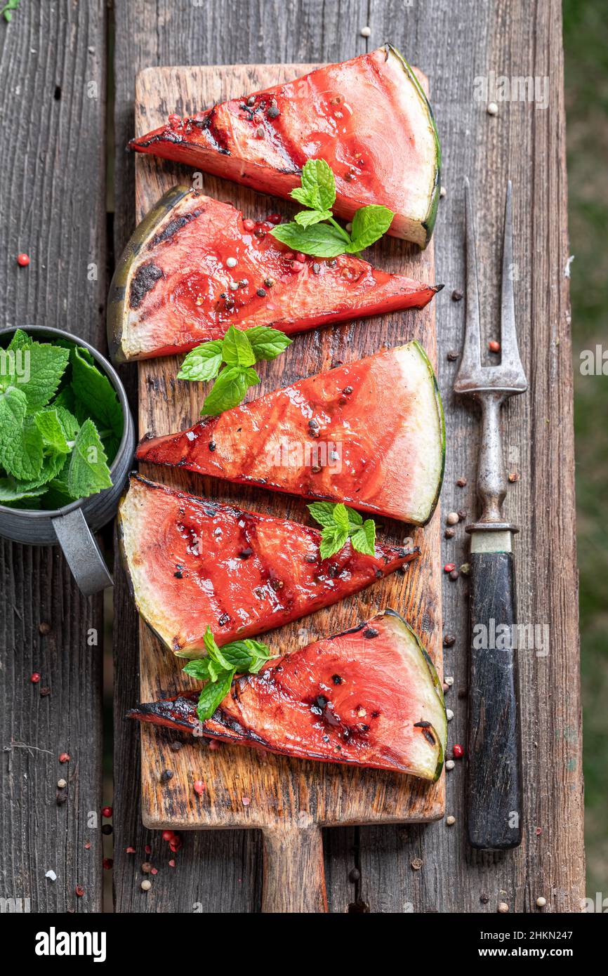 Homemade roasted watermelon with red pepper and mint. Roasted ...