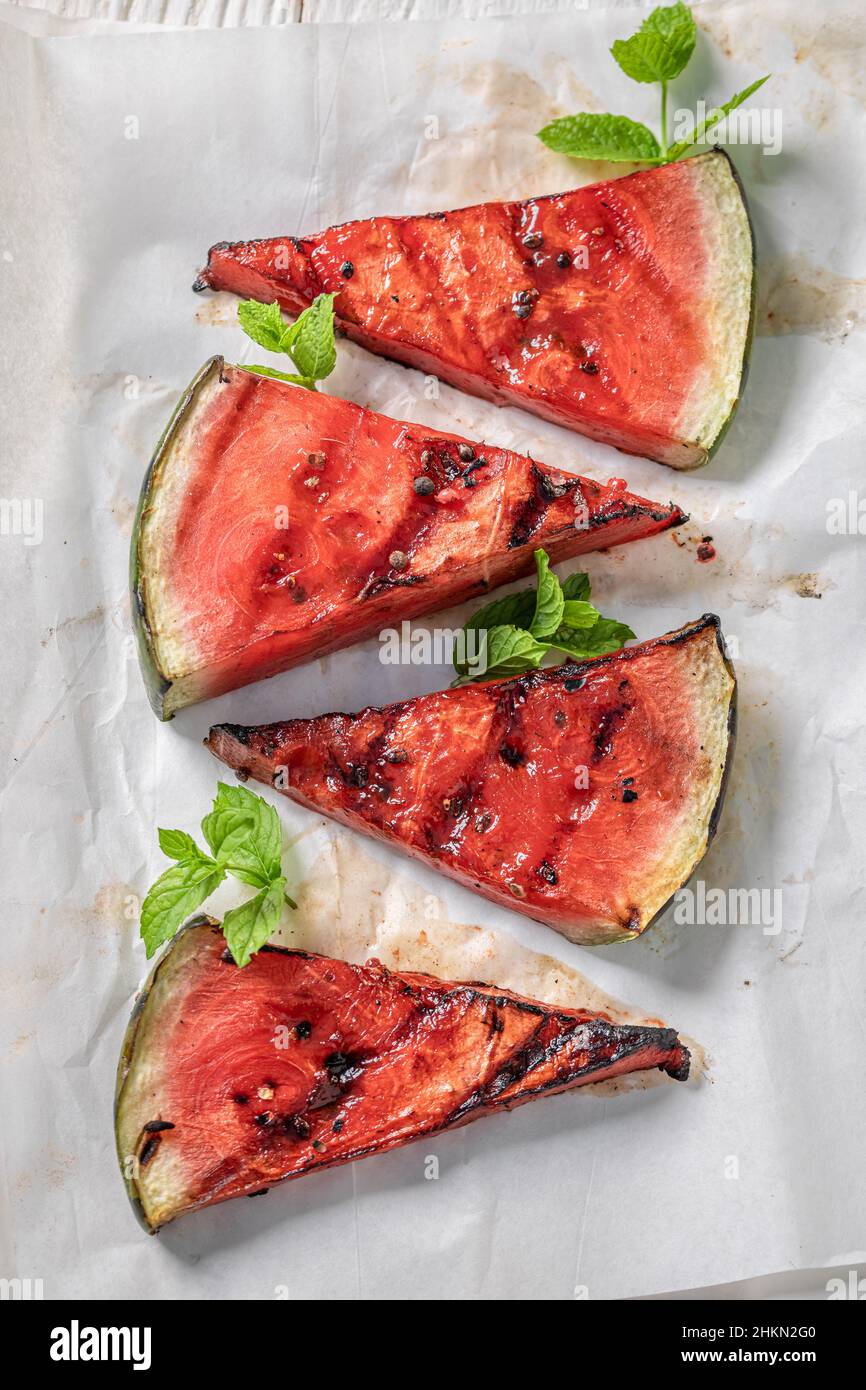 Homemade roasted watermelon with pepper and herbs. Grilled watermelon ...