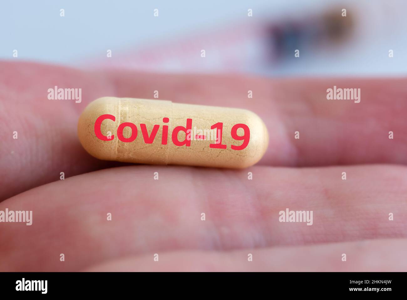 Covid-19 pill capsule on hand. New treatment for new Covid-19 variants ...