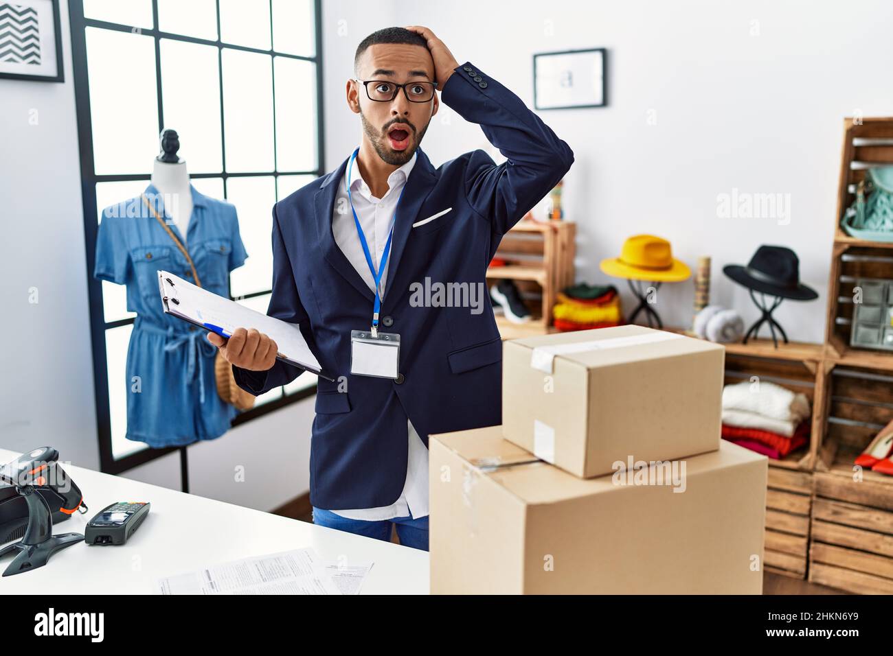African american man working as manager at retail boutique crazy and ...