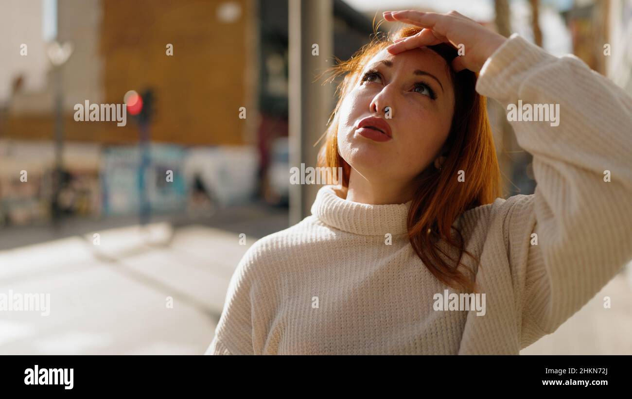 Woman stressed standing outdoors hi-res stock photography and images ...