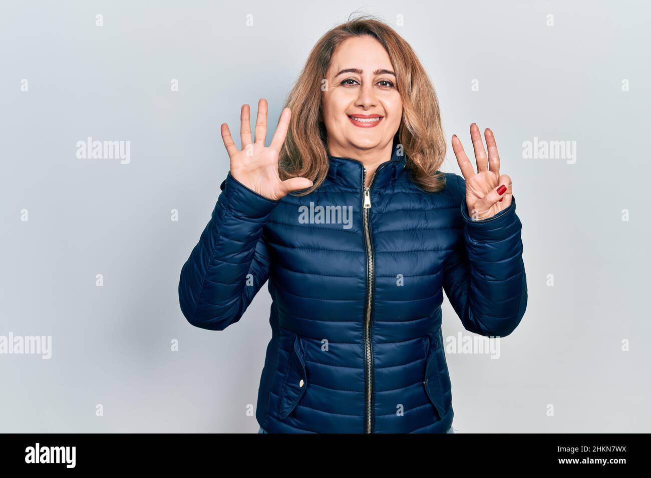 Middle age caucasian woman wearing casual clothes showing and pointing ...