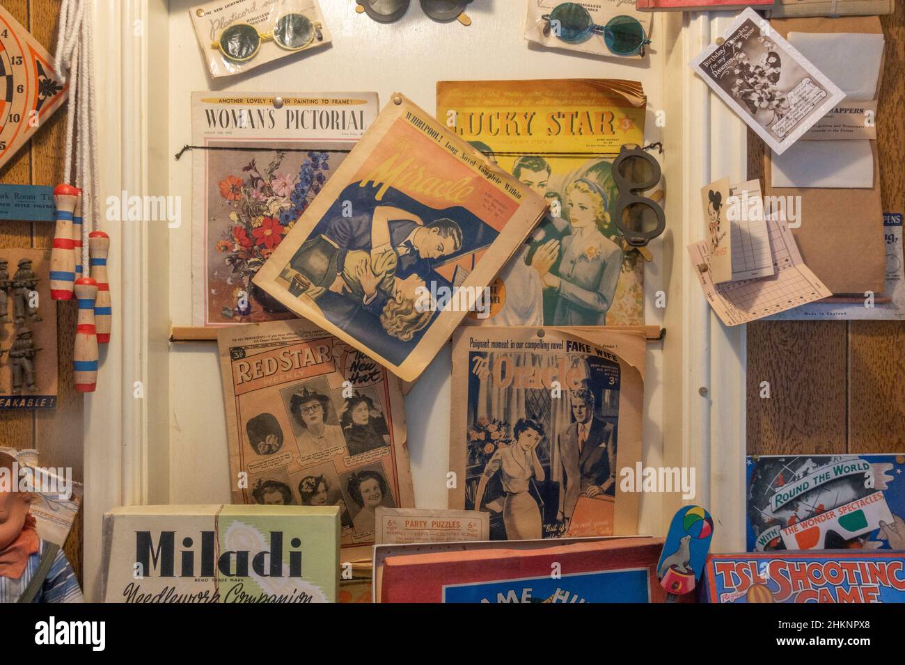 Various old British comics and magazines a Newsagent shop window ...