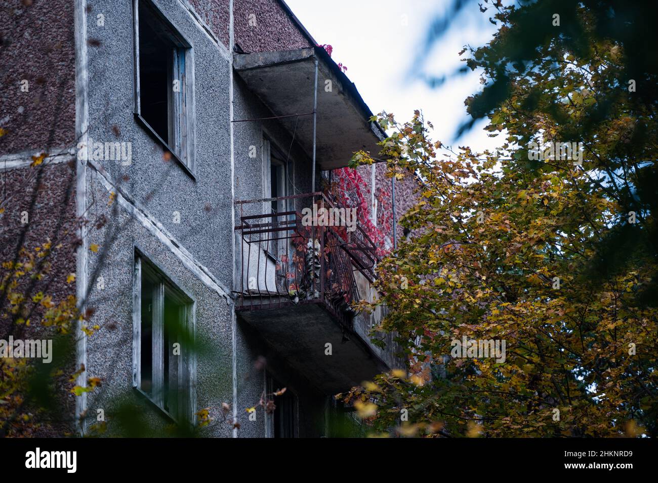 Abandoned buildings and artifacts lie in various states of ...