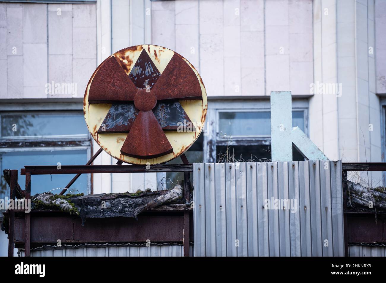 Abandoned buildings and artifacts lie in various states of ...