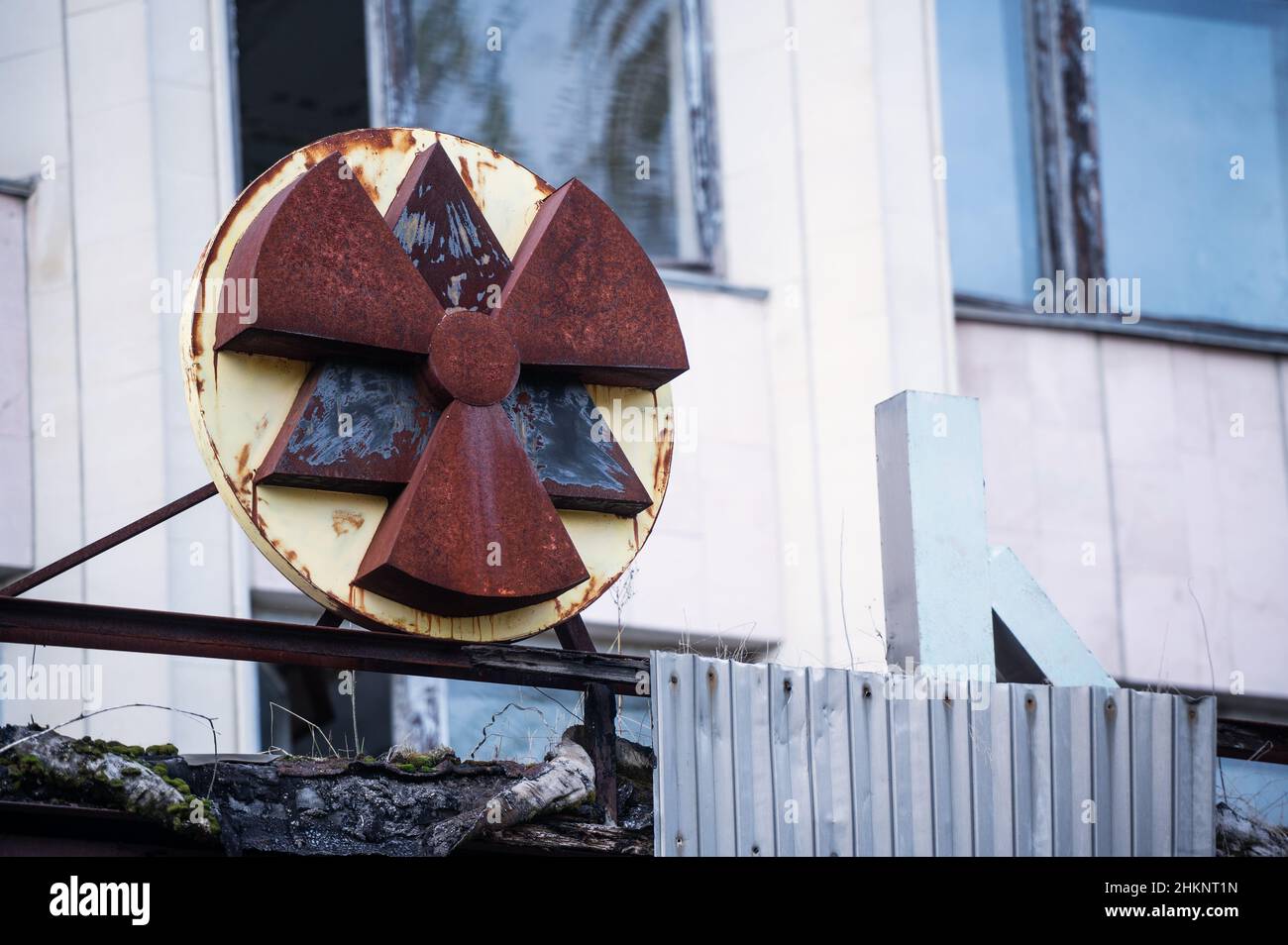 Abandoned buildings and artifacts lie in various states of ...