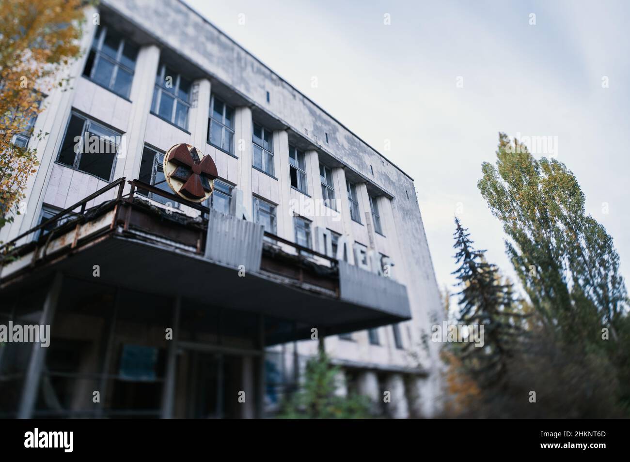 Abandoned buildings and artifacts lie in various states of ...