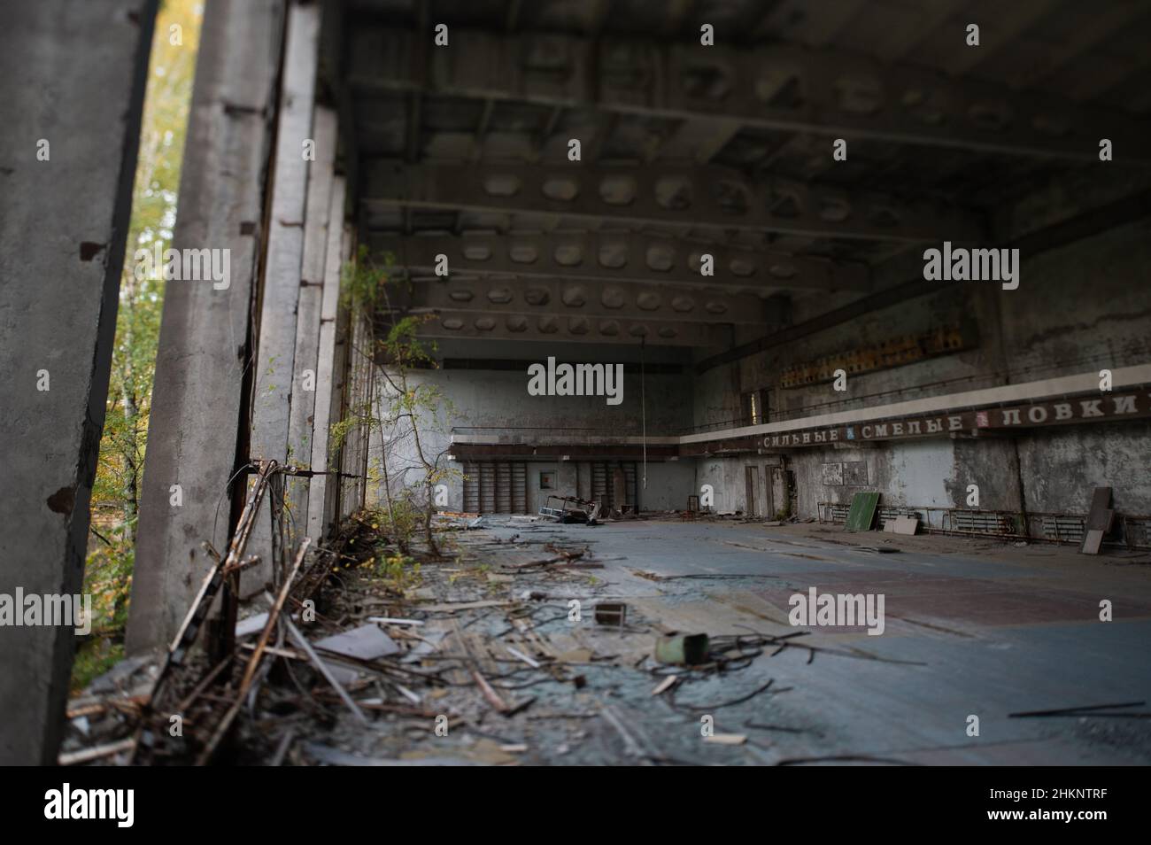 Abandoned buildings and artifacts lie in various states of ...