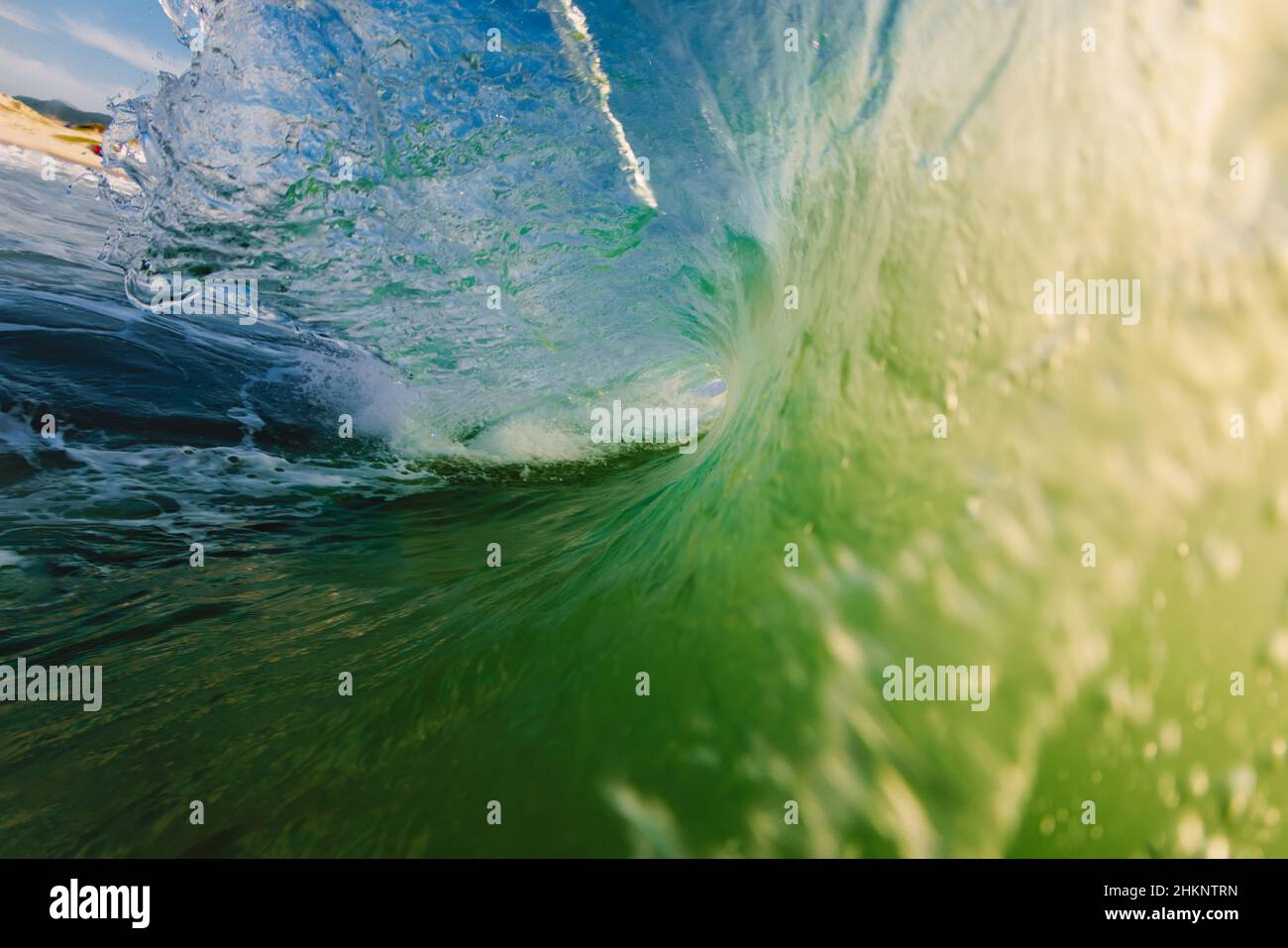 Perfect surfing swell in ocean. Barrel wave with morning light Stock ...