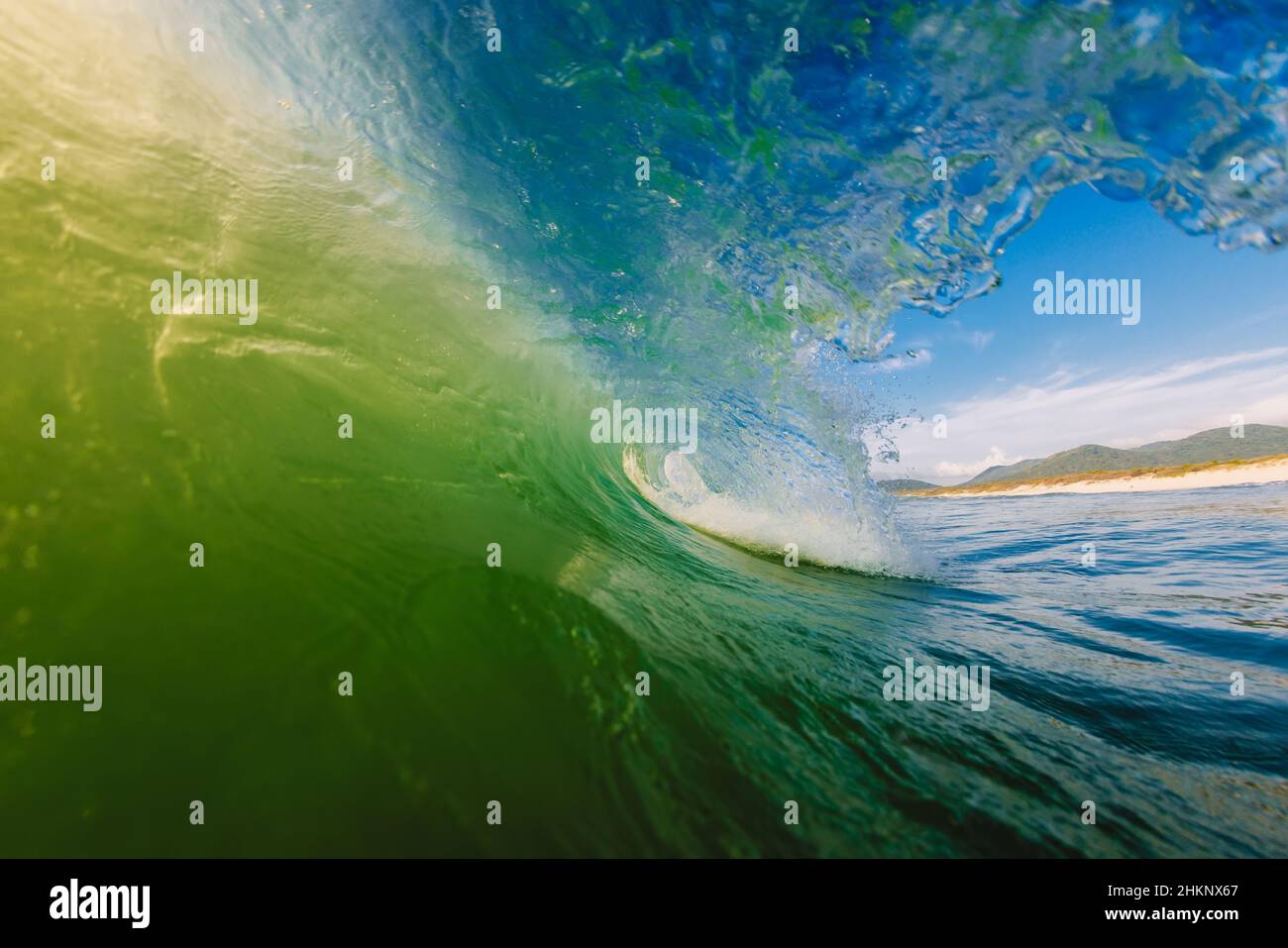 Perfect surfing swell in ocean. Barrel wave with morning light Stock ...