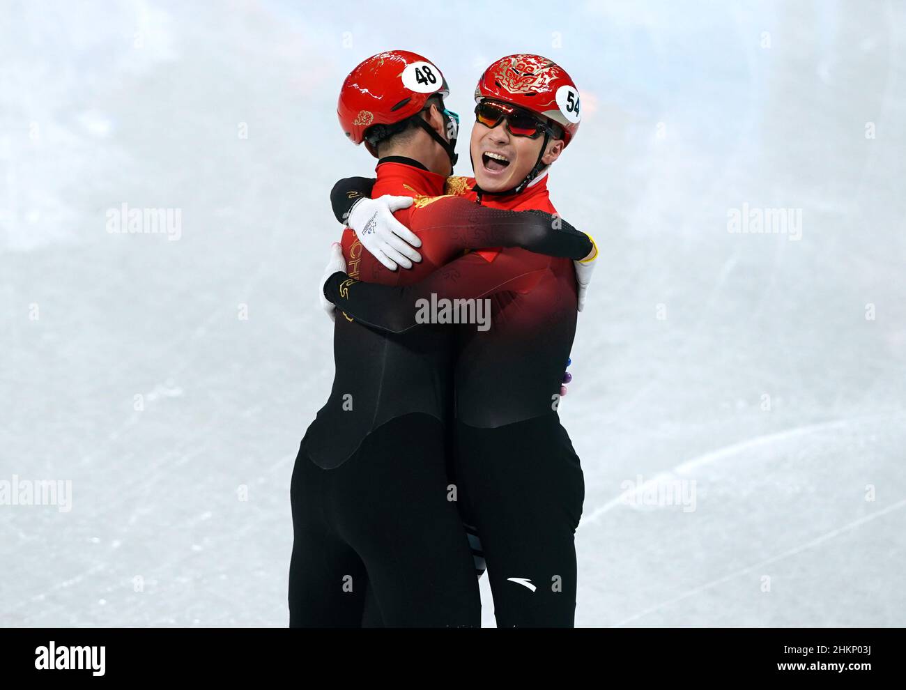 China's Dajing Wu (left) and Ziwei Ren celebrates after winning gold in ...