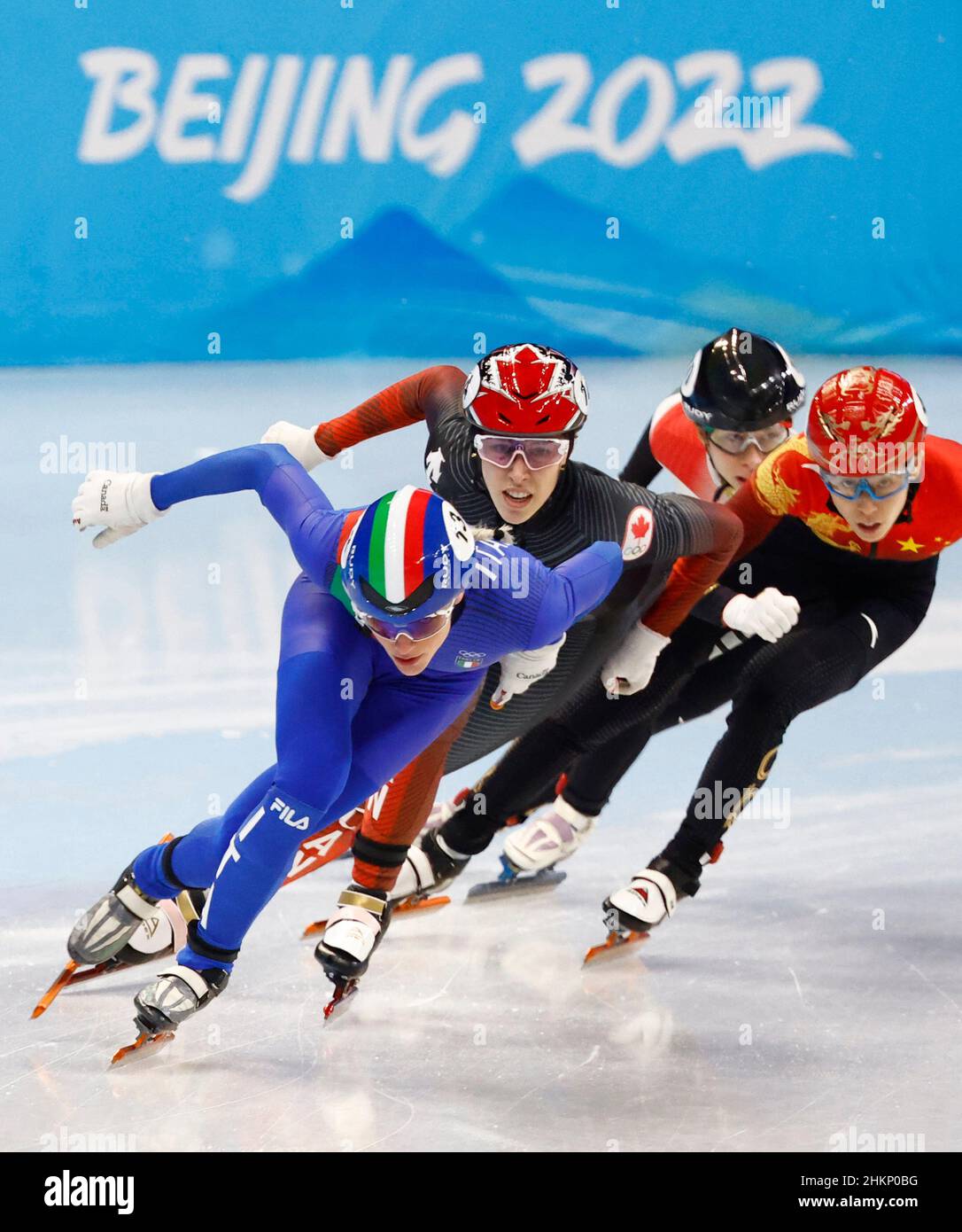 Short track speed skating mixed team relay final hi-res stock ...