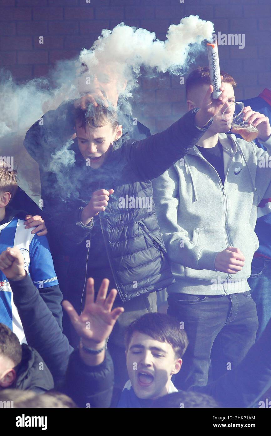 Hartlepool United fans let off a flare Stock Photo - Alamy
