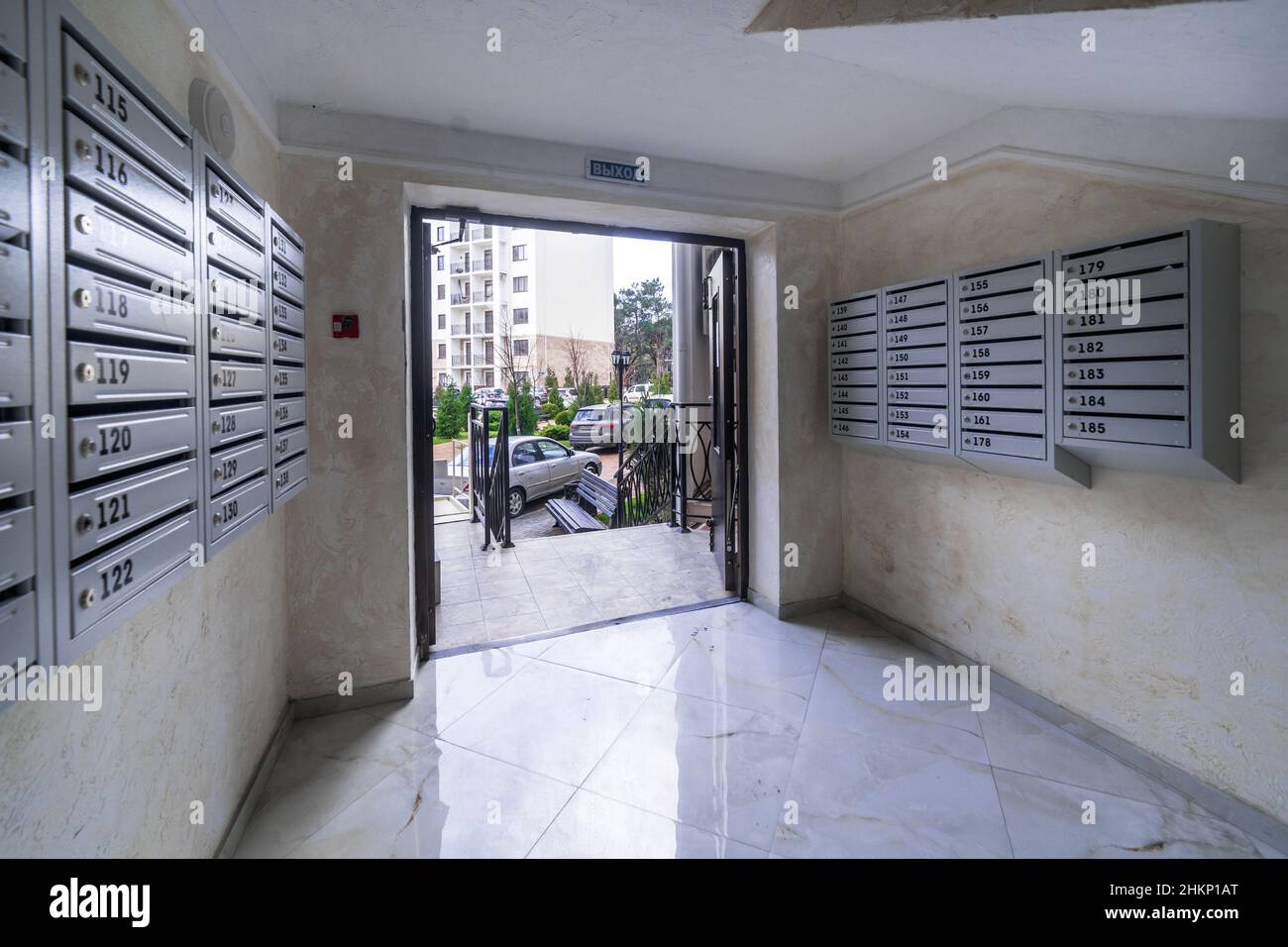 exit from the entrance of a new multi-storey residential building ...