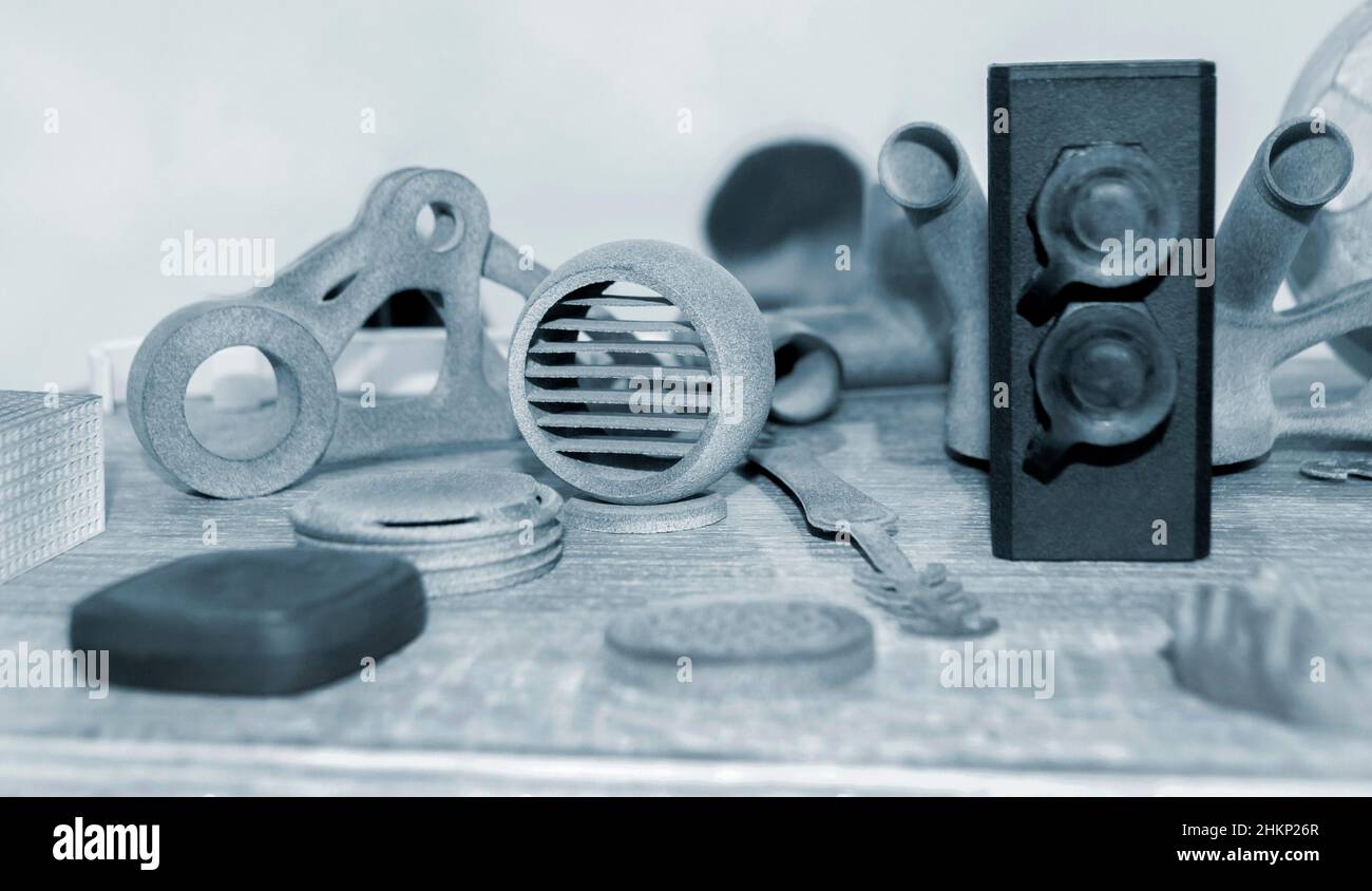 Different objects printed on industrial powder 3D printer. Multi Jet ...