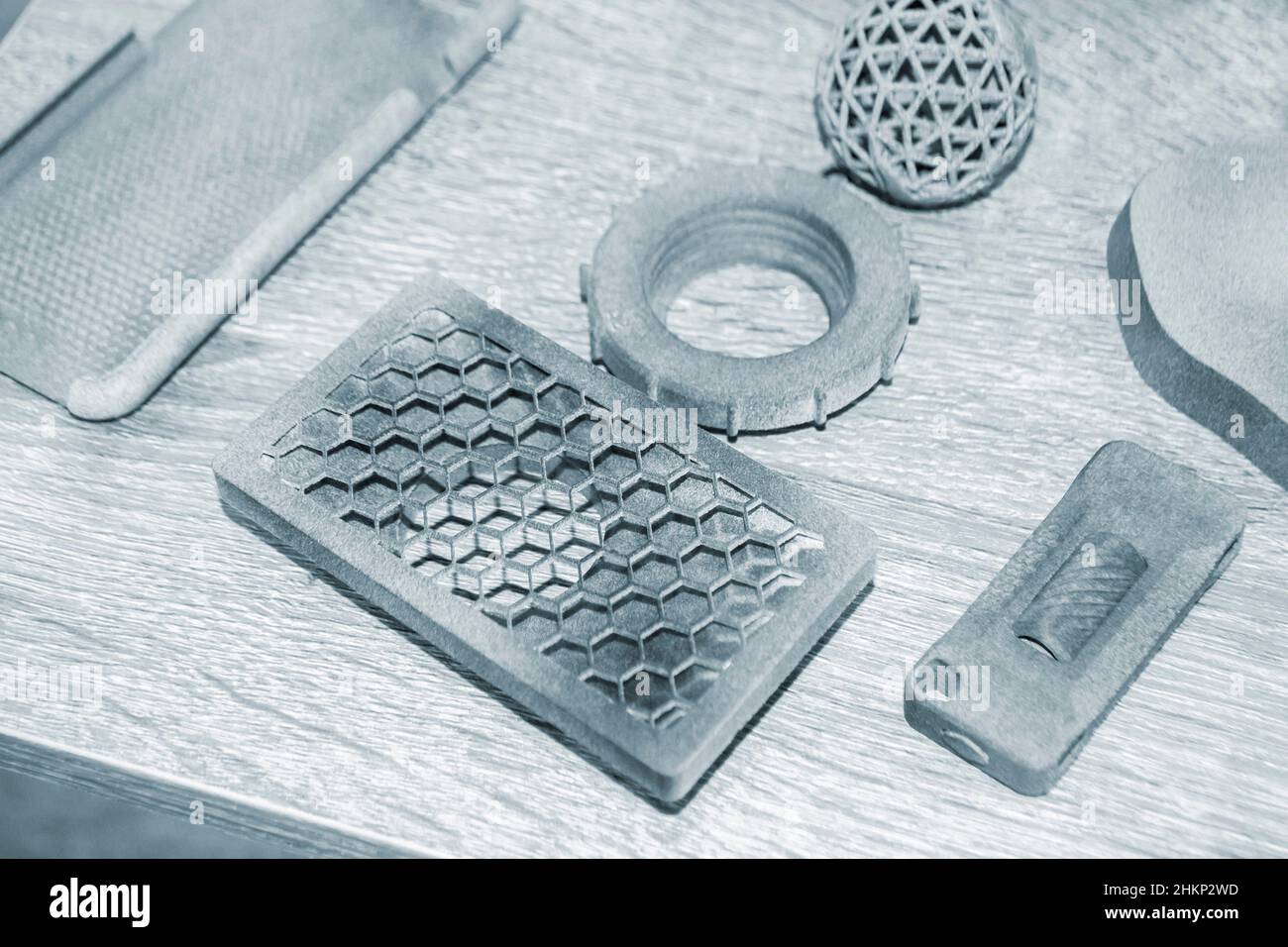 Different gray models printed on 3d printer from powder close-up. 3D ...