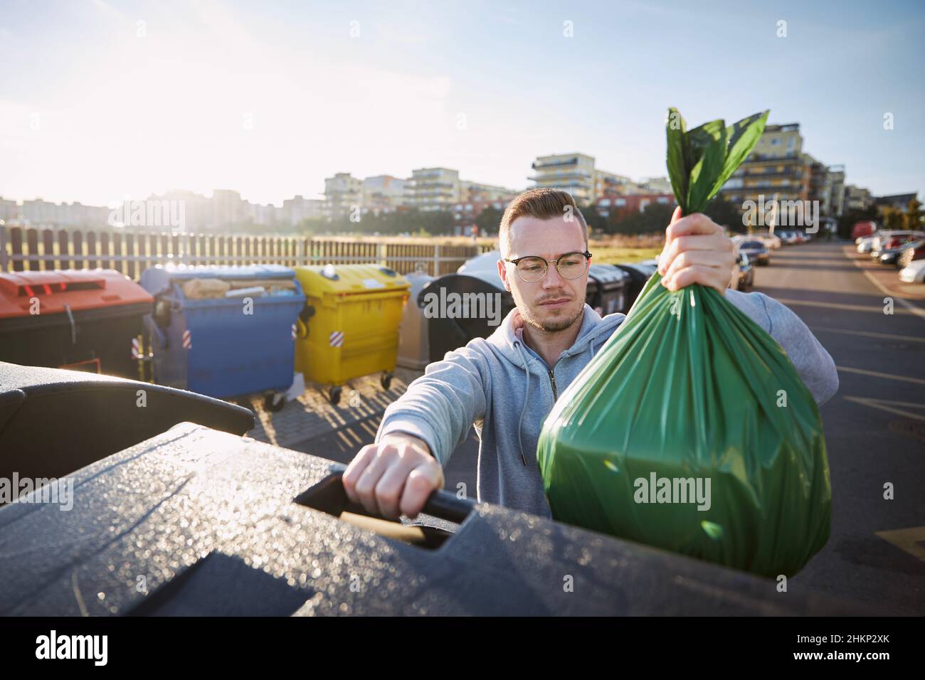 Person throwing rubbish hi-res stock photography and images - Alamy