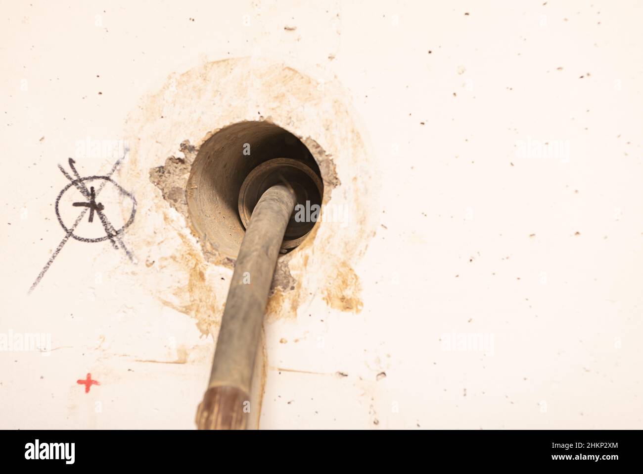 A wall breakthrough through a core drilling by professionals with the ...