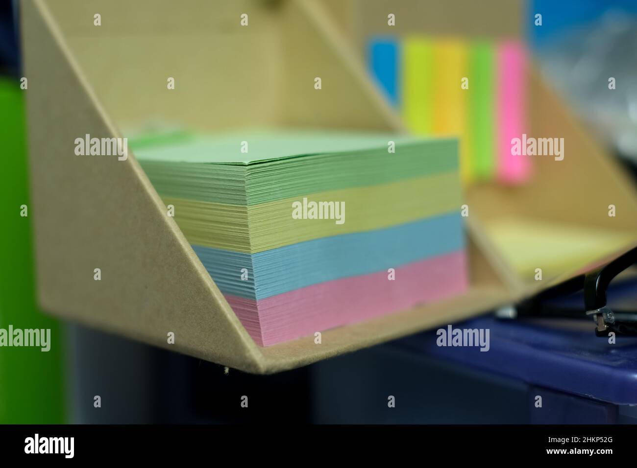 Colourful notebooks on the desk Stock Photo - Alamy