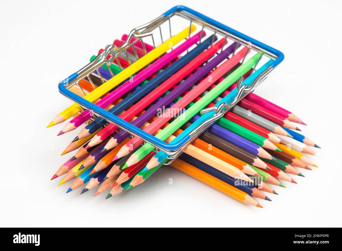 set of colored pencils for drawing in a basket from the market. tool ...