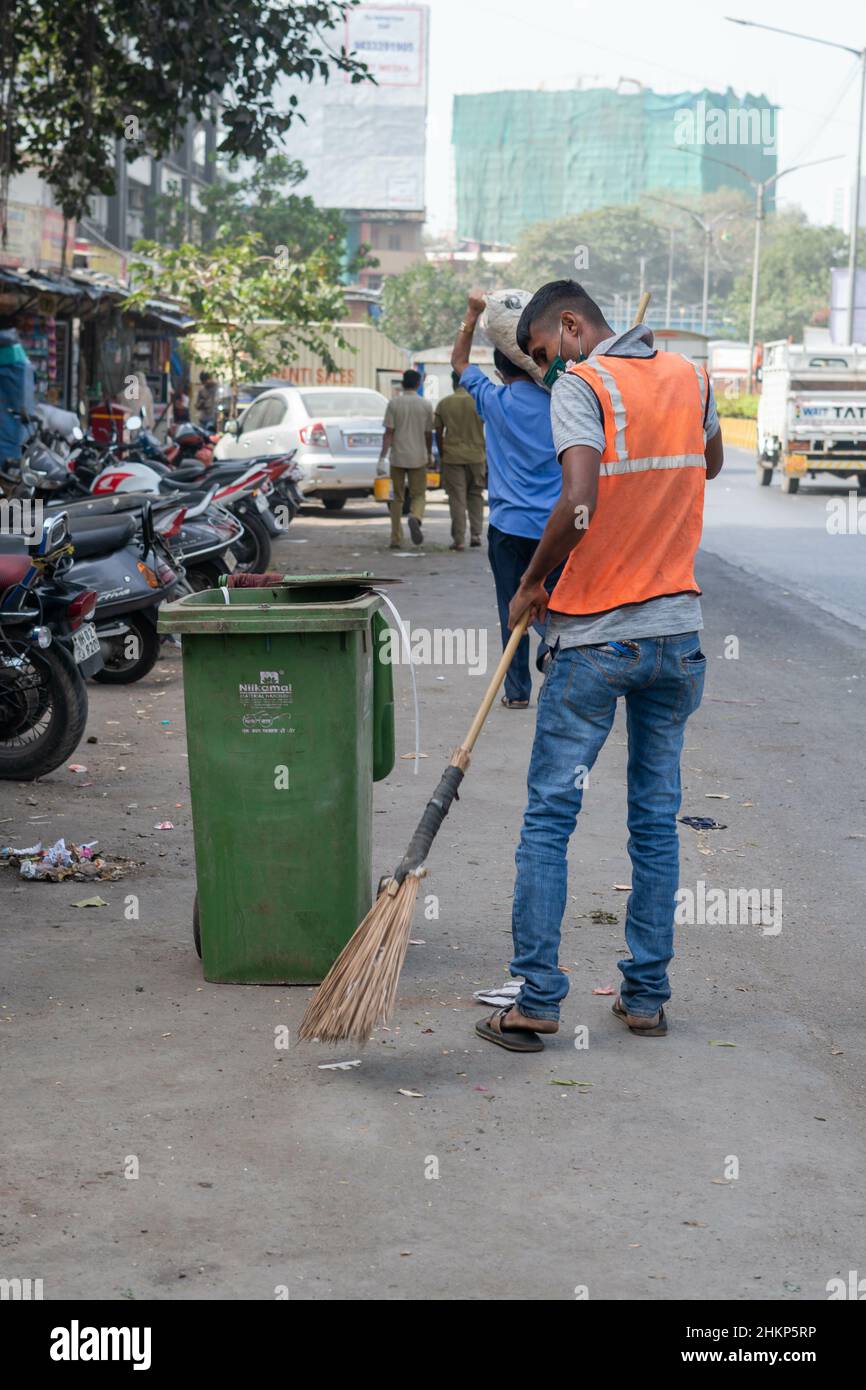 Cleaning the streets in india hi-res stock photography and images - Alamy