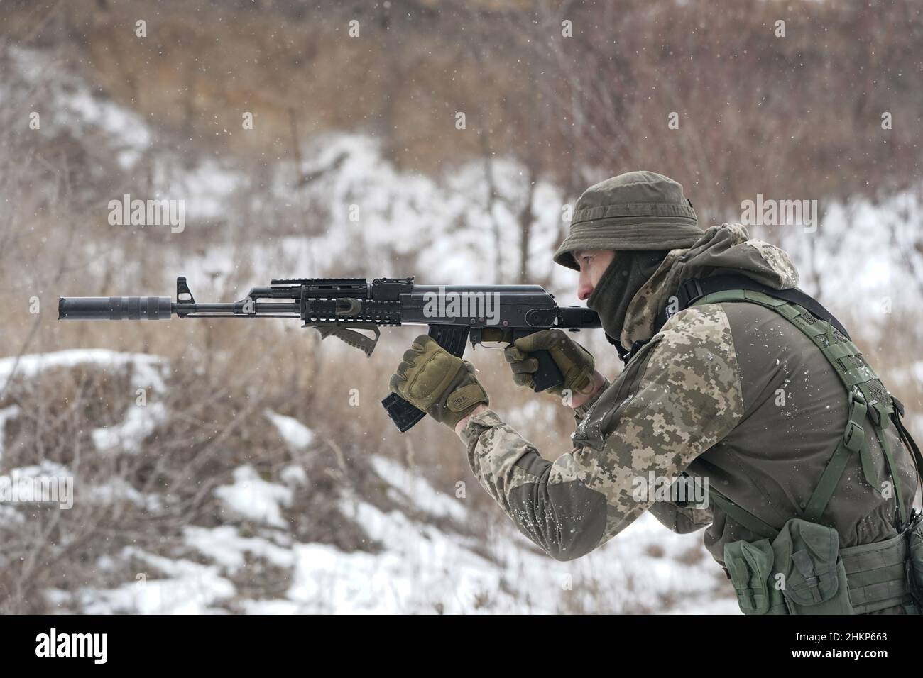 Obukhiv, Ukraine. 5th Feb, 2022. A leader loads a clip into an ...