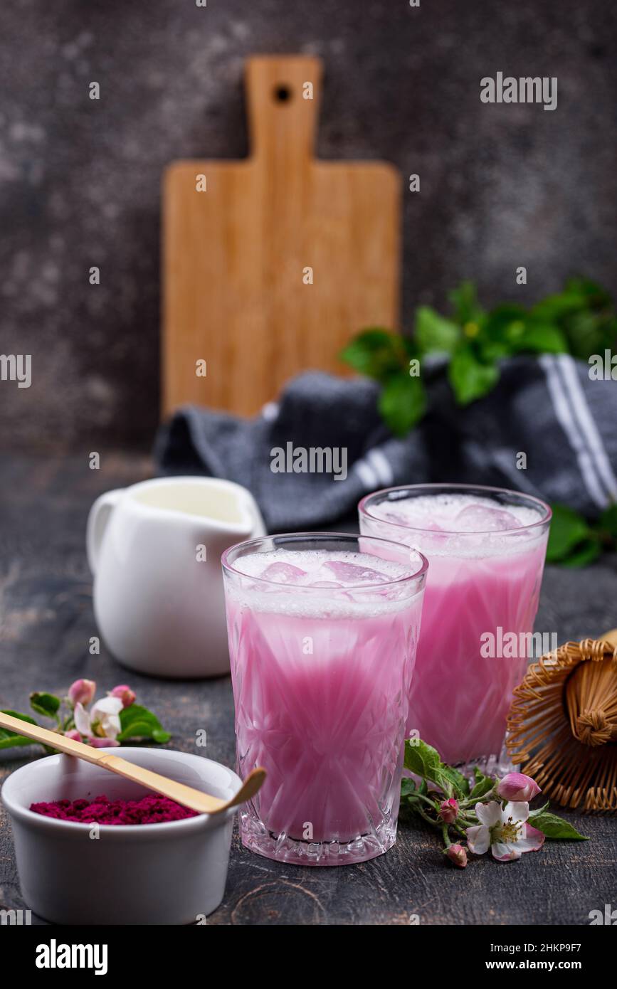 Pink matcha ice latte with milk Stock Photo - Alamy