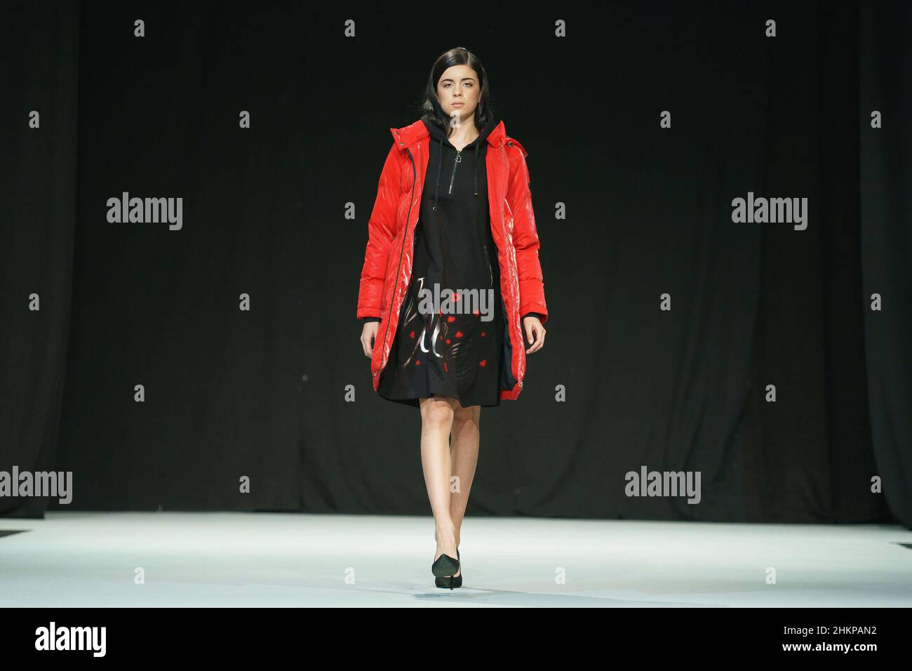 A model walks the runway designed by the DOLCEZZA fashion show brand at ...