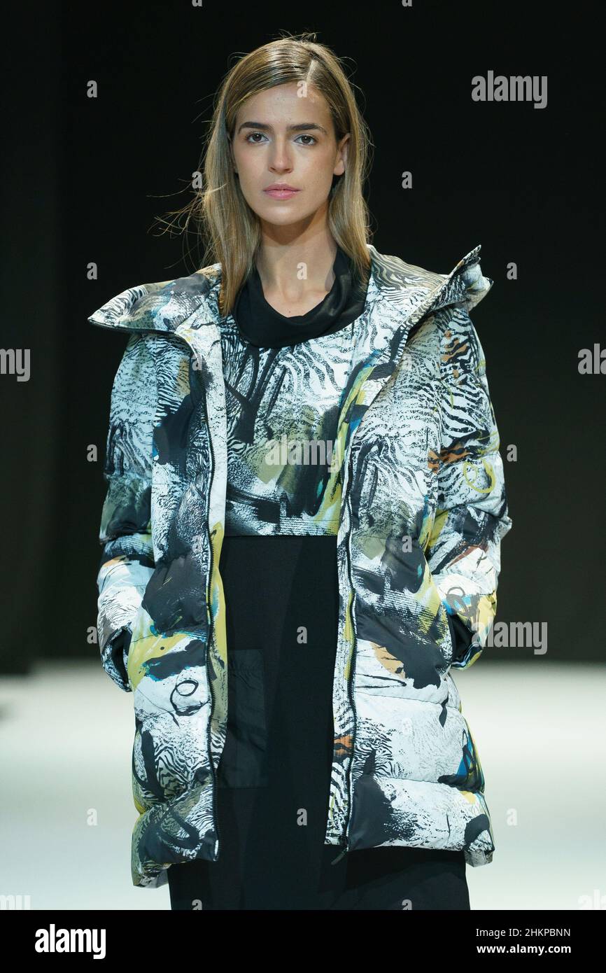 A model walks the runway designed by the DOLCEZZA fashion show brand at the Momad fashion show ...