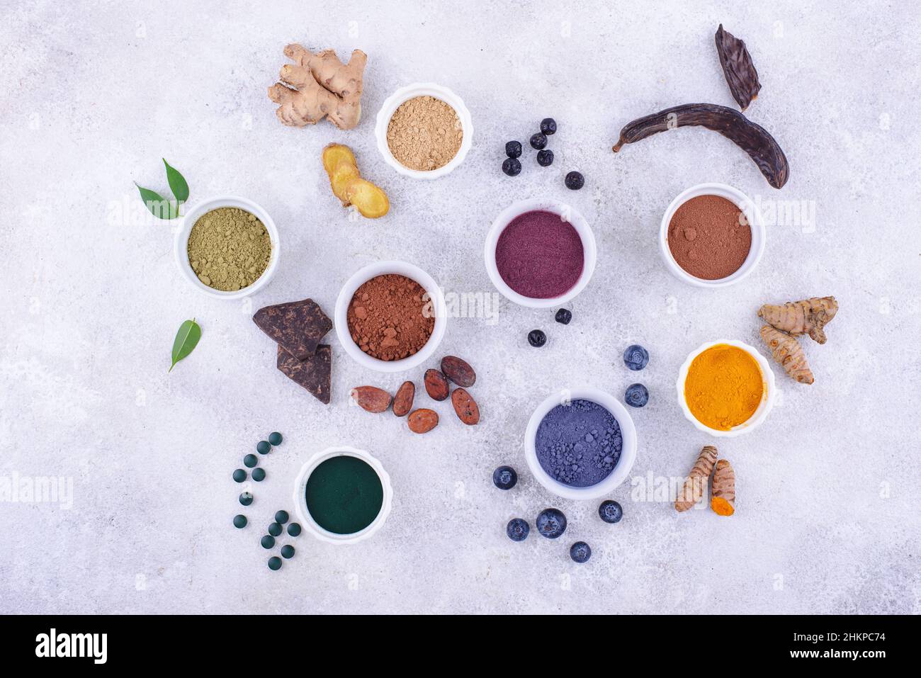 Various healthy superfoods powder assortment Stock Photo - Alamy