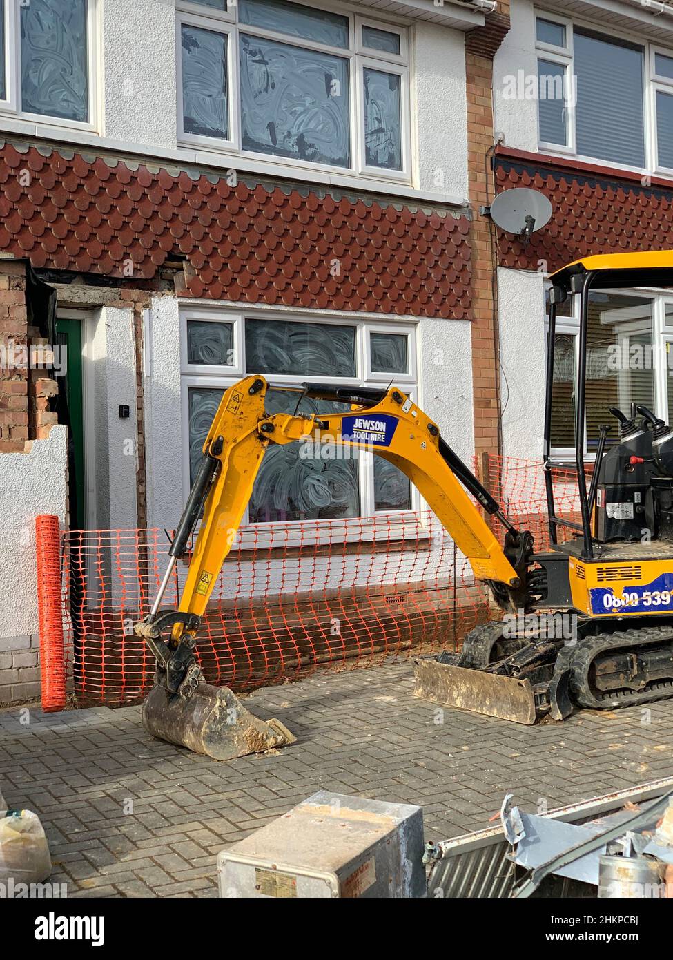 House extension Northampton UK digger vehicle hole large front door cab ...