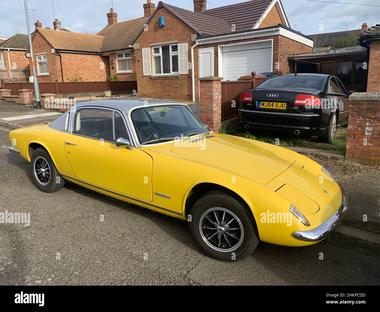 Yellow Lotus Elan +2 sports car Northampton England classic vintage old ...