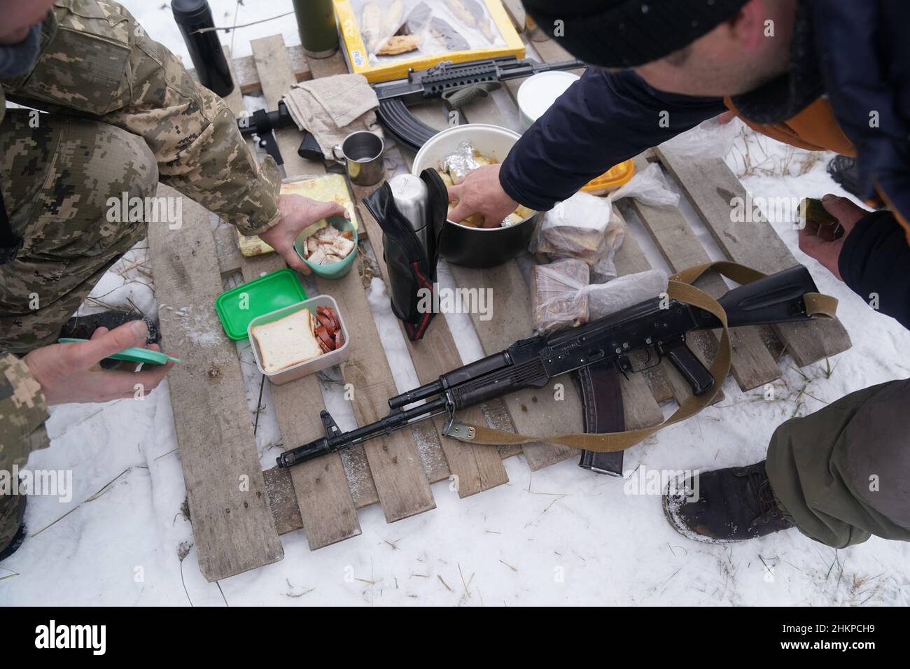 Obukhiv, Ukraine. 5th Feb, 2022. Automatic weapons are laid down next ...